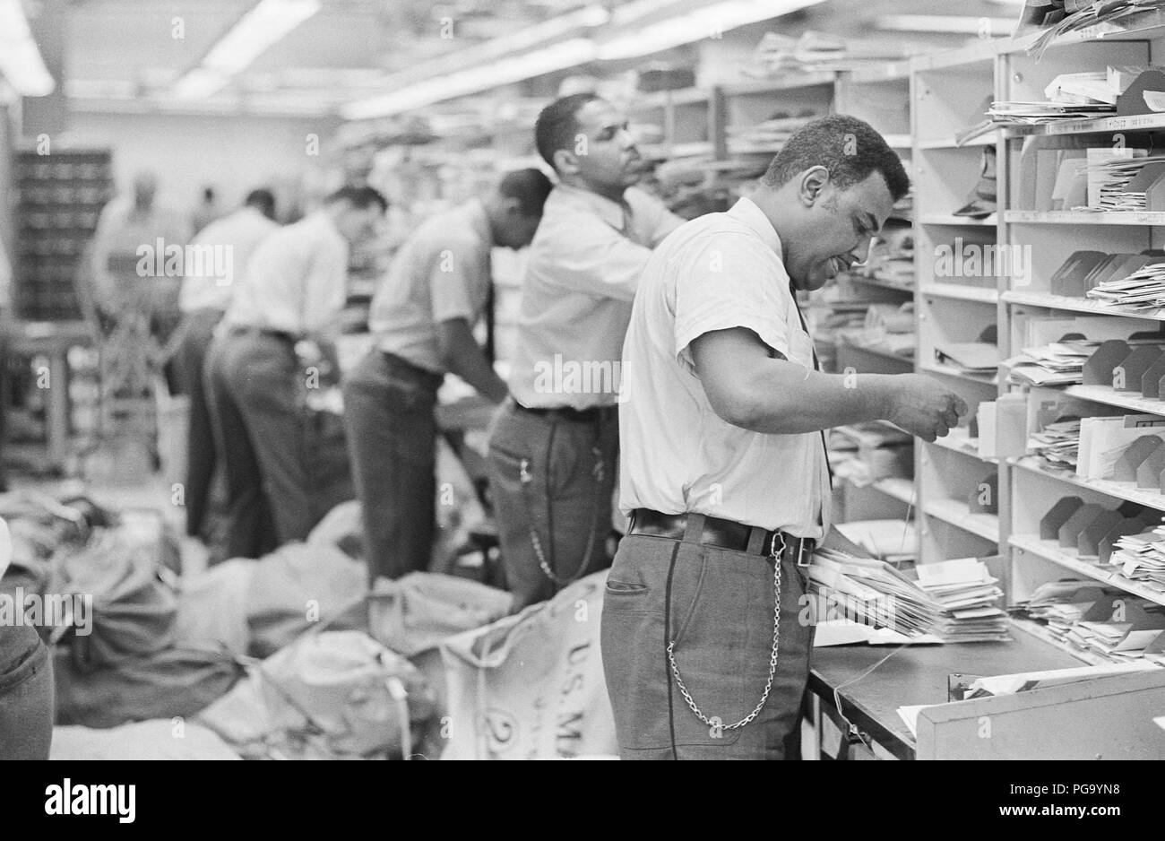 African American US Postal Service employees at work at Washington, DC ...