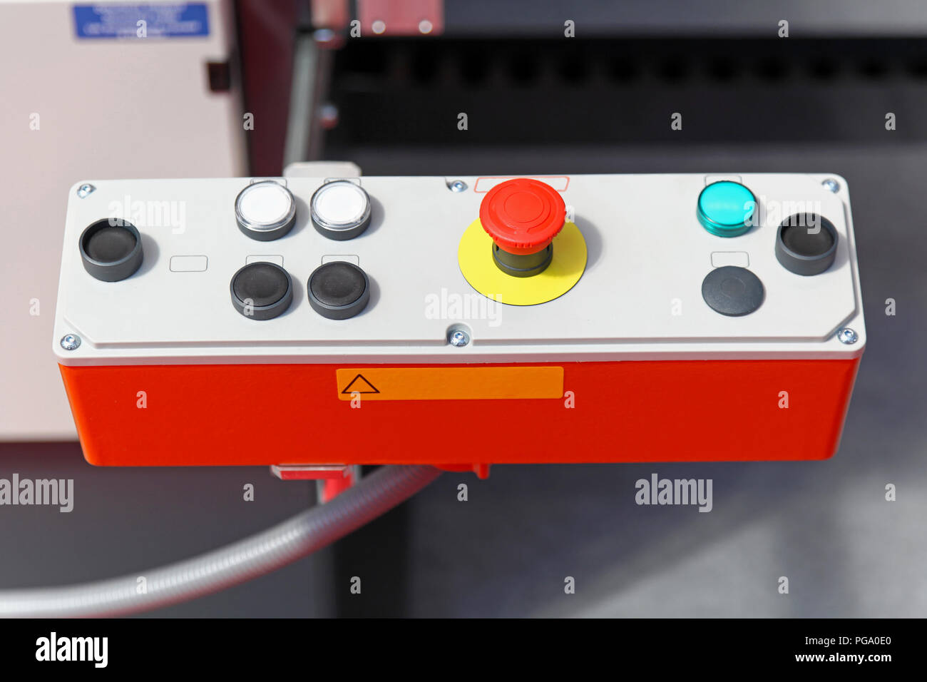 Machinery control with red stop push button Stock Photo - Alamy