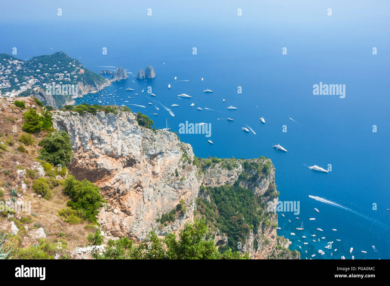view of Faraglioni cliffs and Tyrrhenian Sea on Capri Island, Italy ...