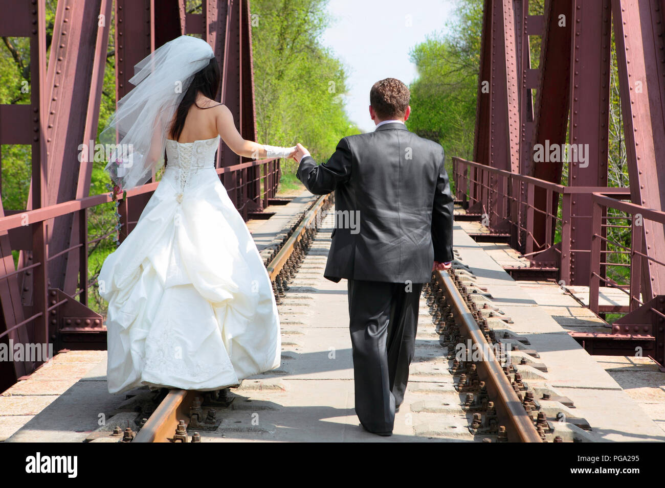 Young couple walking on railway hi-res stock photography and images - Alamy