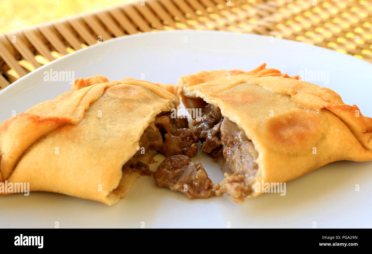 Beef filled Empanada or Empanada de Pino, delicious Chilean baked pasty ...