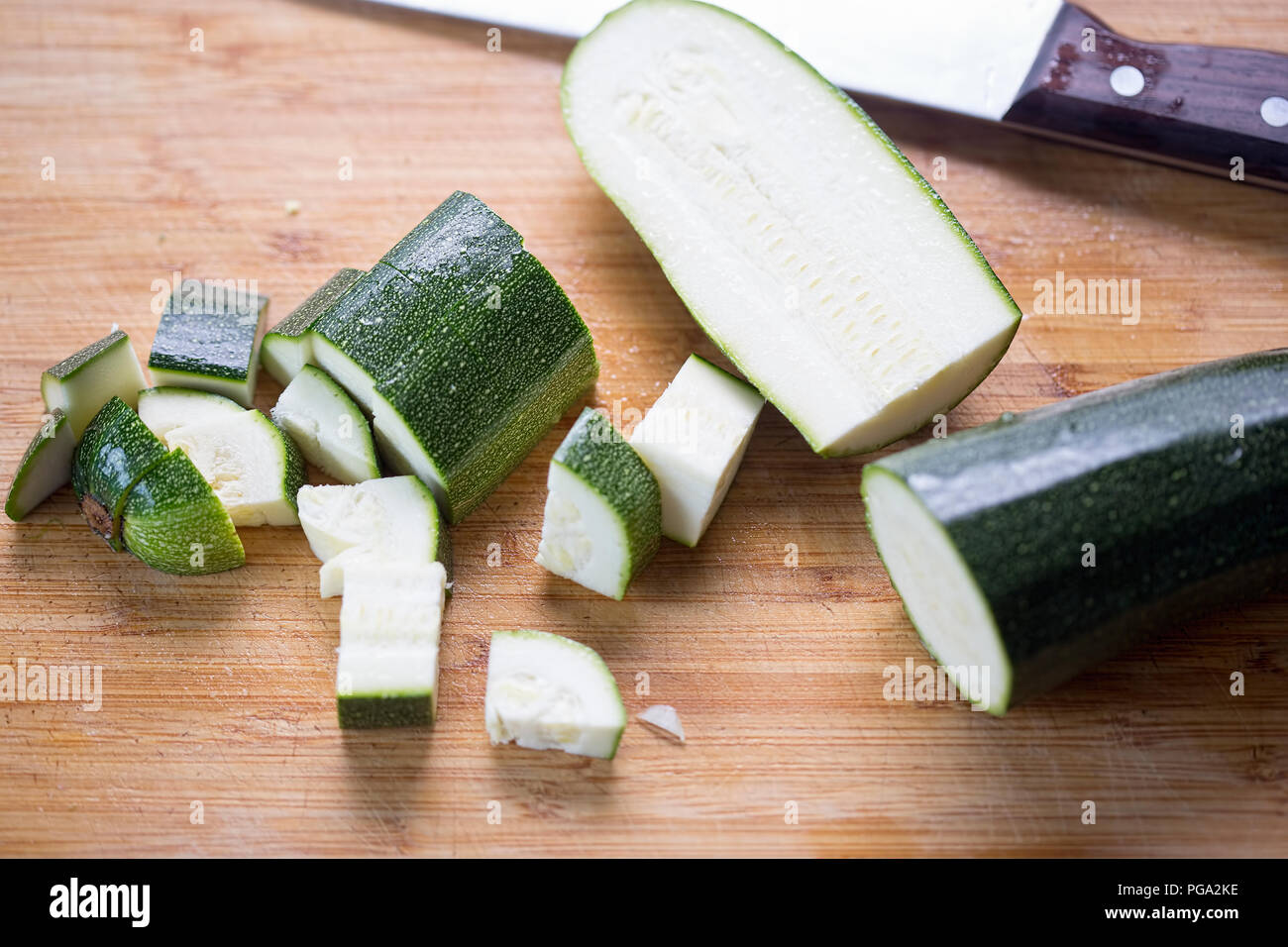 Courgette on wooden hi-res stock photography and images - Alamy