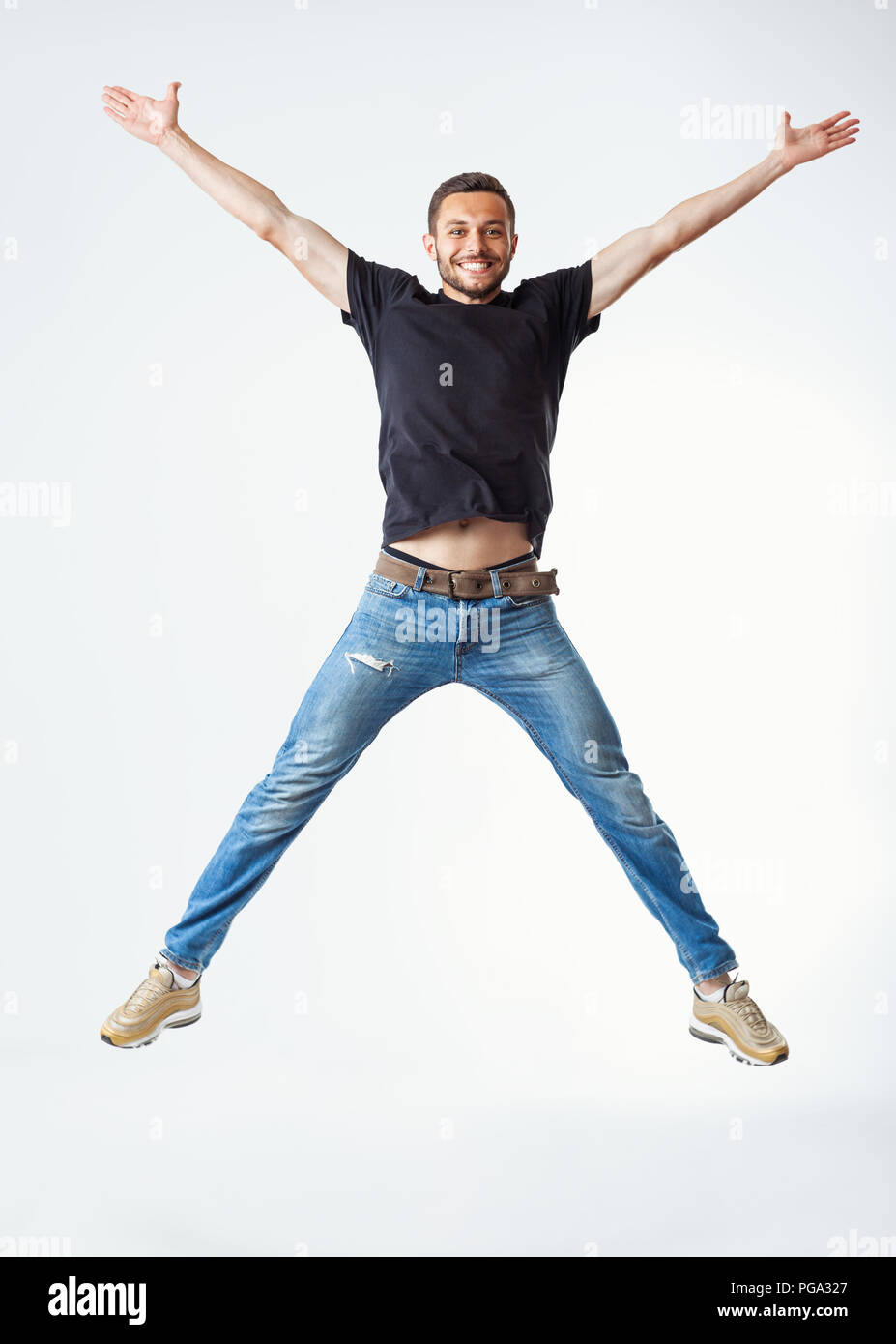 Excited young man joyfully hi-res stock photography and images - Alamy