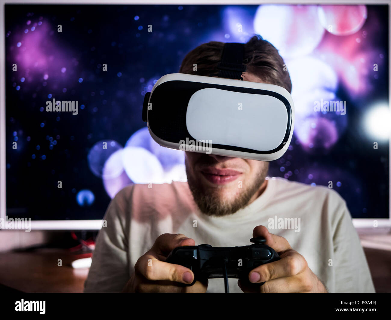 close up happy emotion person playing video games with controller on ...