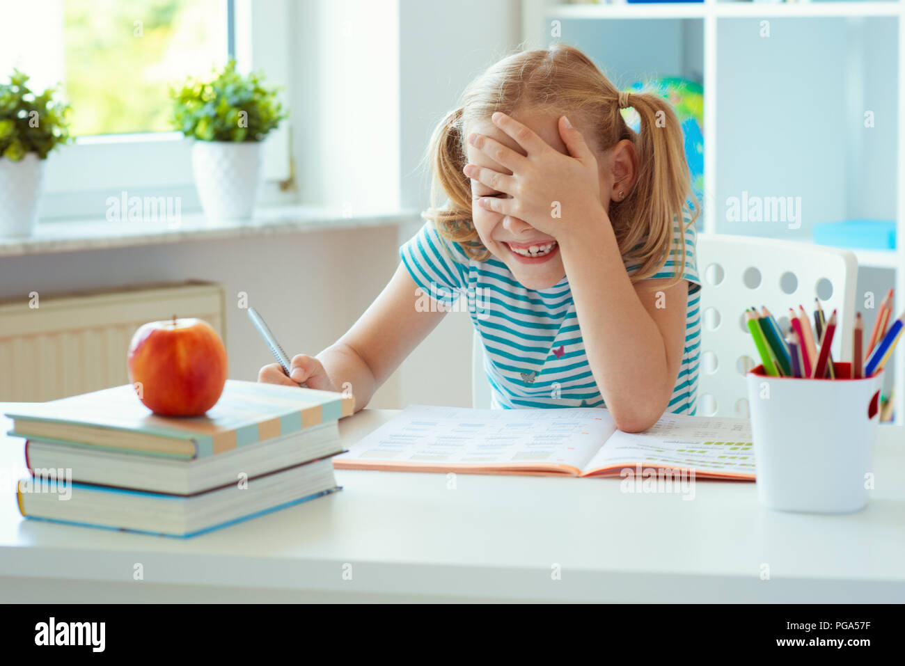 Angry kid in class hi-res stock photography and images - Alamy