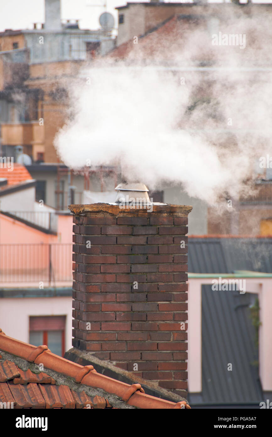Pollution chimney house italy hi-res stock photography and images - Alamy