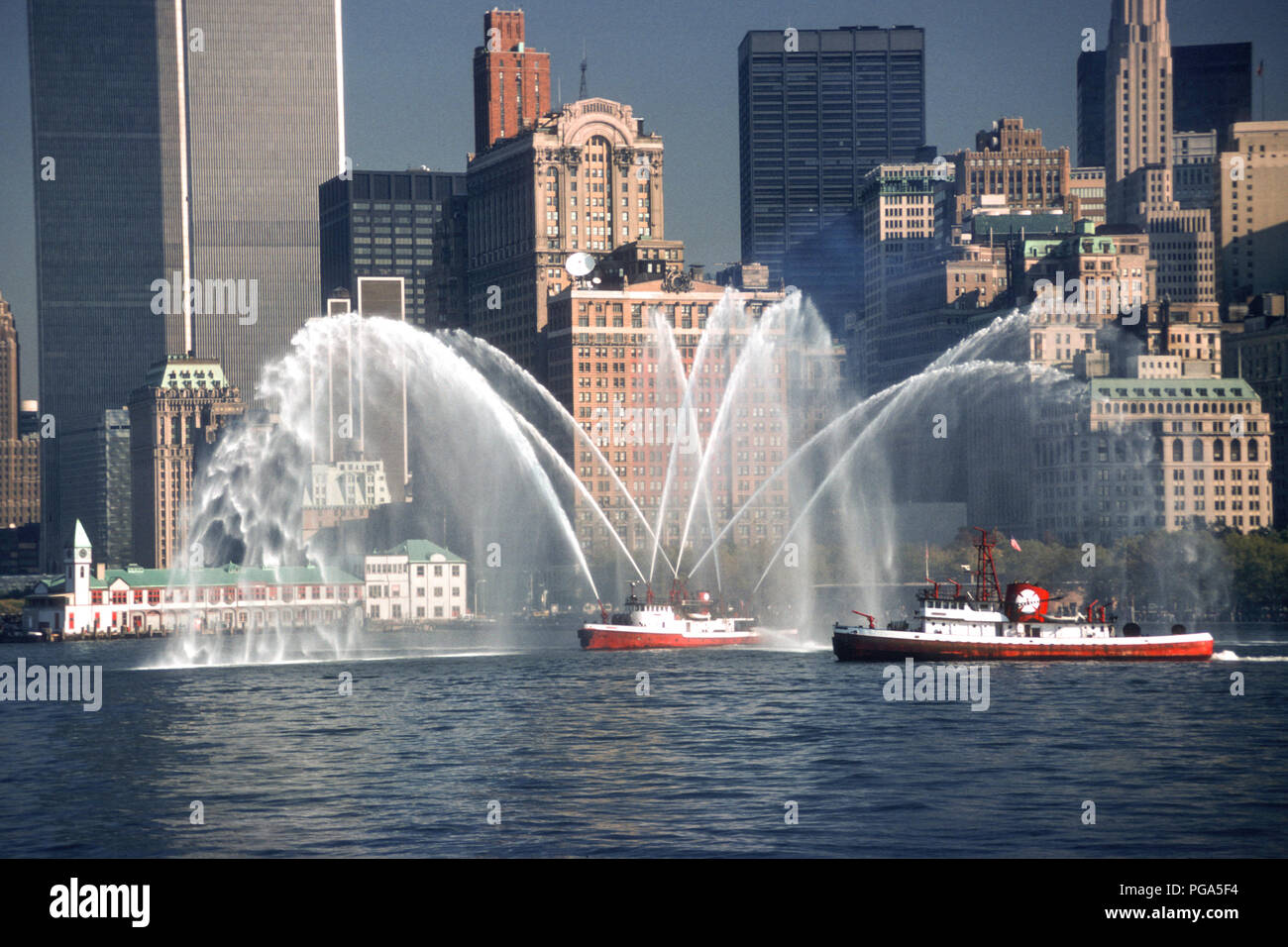 Vintage 1988 View of FDNY Fireboat Spraying water with Lower Manhattan ...