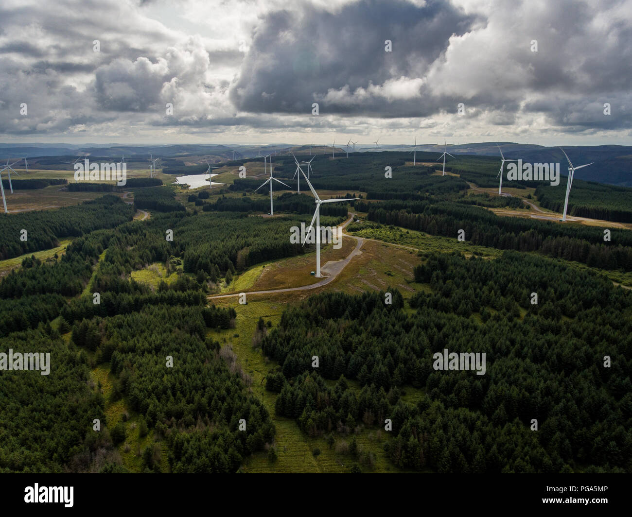 Dramatic Aerial drone view of the Pen y Cymoedd wind farm on the Rhigos ...