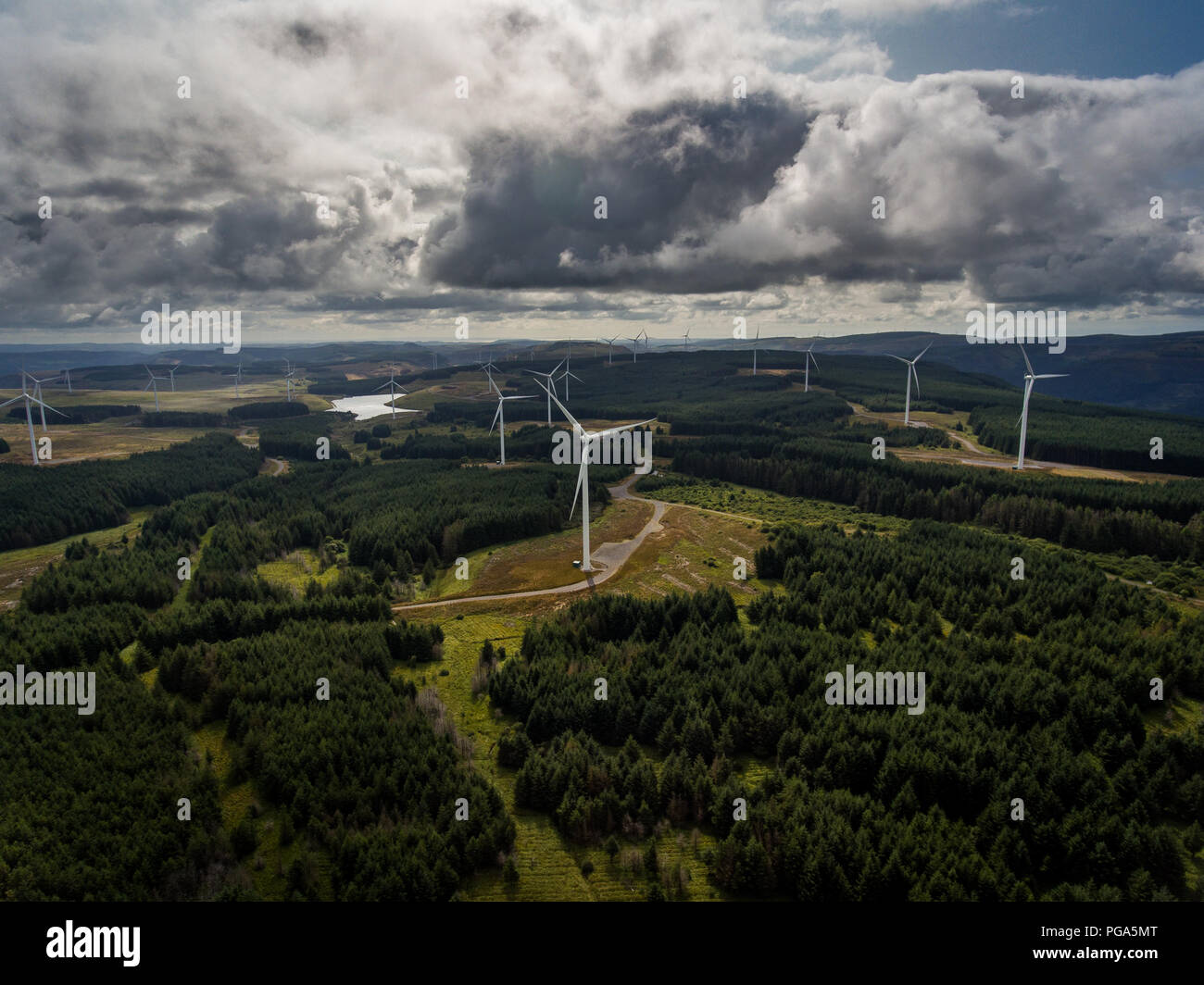 Dramatic Aerial drone view of the Pen y Cymoedd wind farm on the Rhigos ...