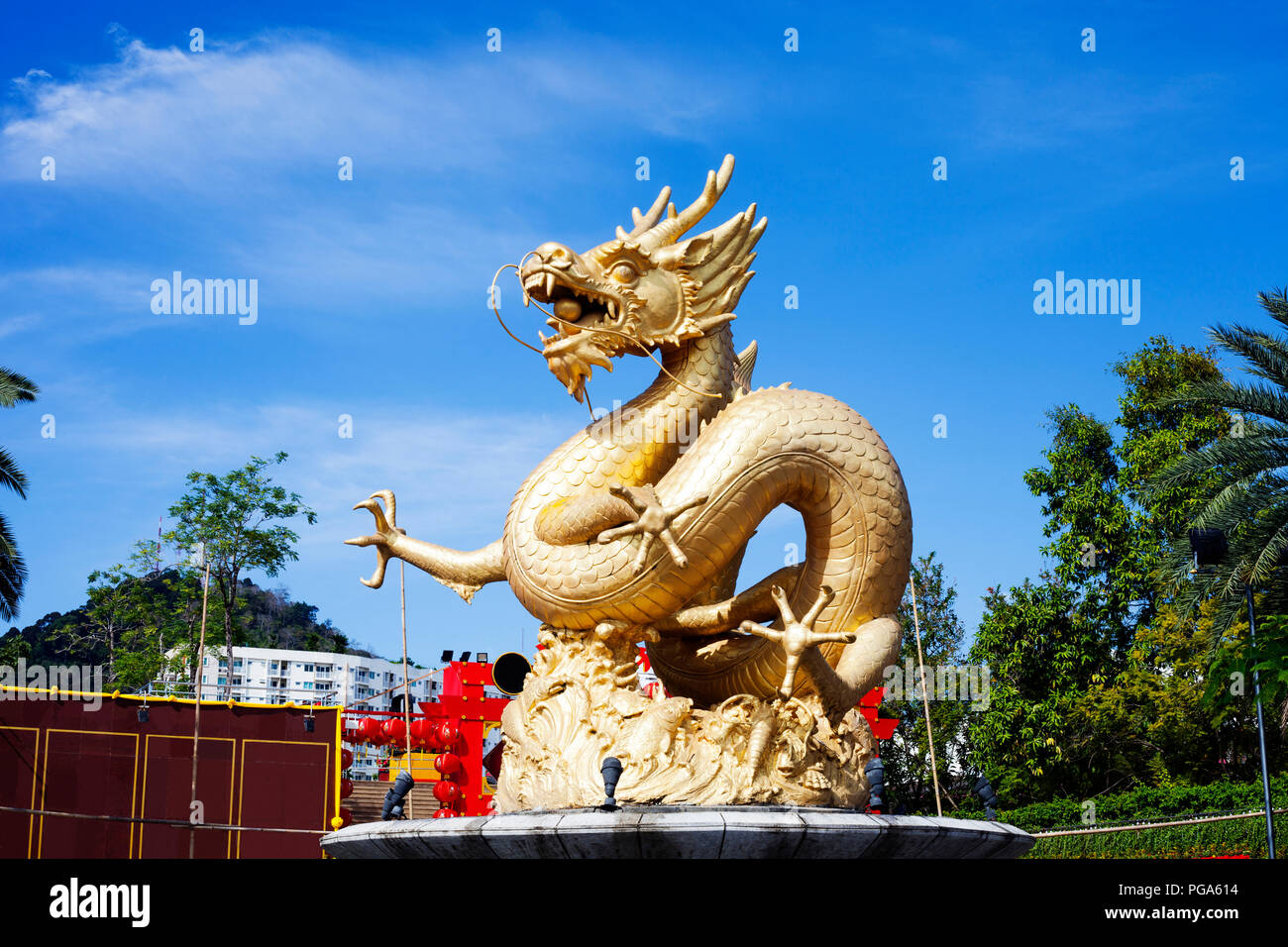 Fountain with gold Dragon in Phuket Town, Thailand. Golden chinese Sea ...