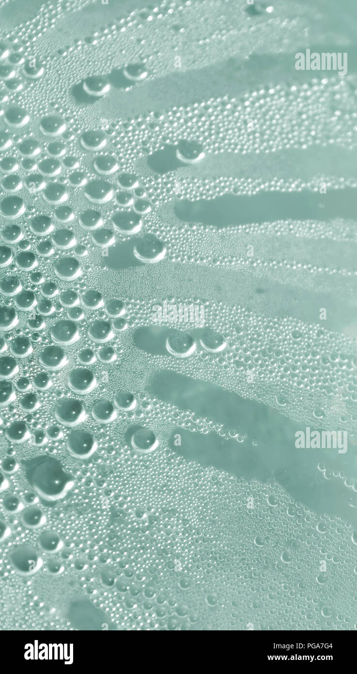 Water drops at gradient background. Glass covered with water drops ...