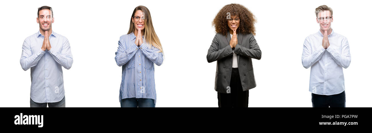 Team of business men and women praying with hands together asking for ...