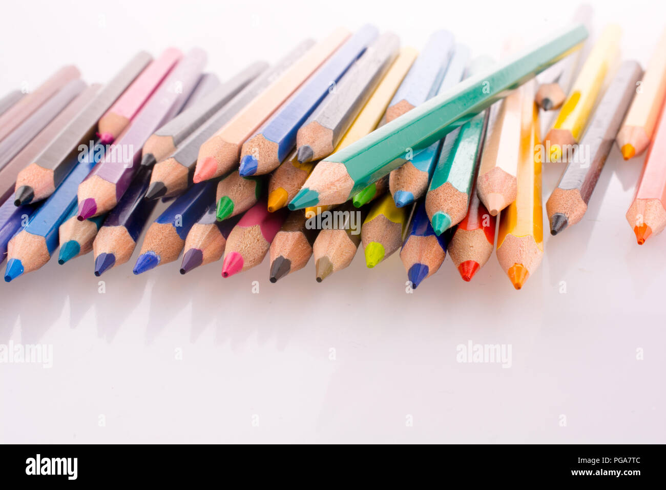 Color pencils on a white background Stock Photo - Alamy