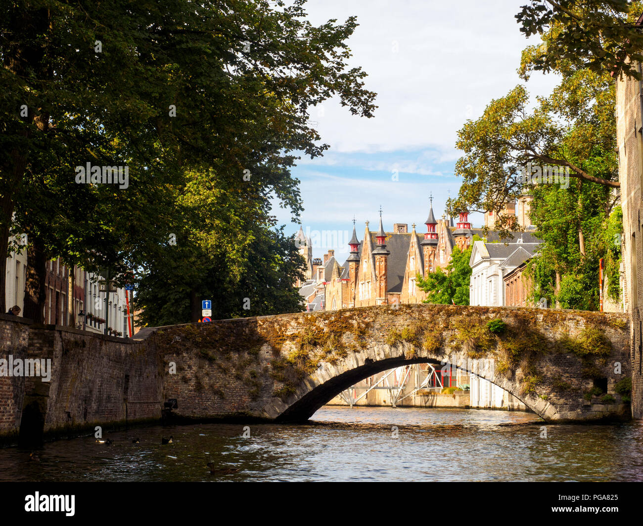 Brugse Vrije and buildings along the Groenerei canal - Bruges, Belgium ...