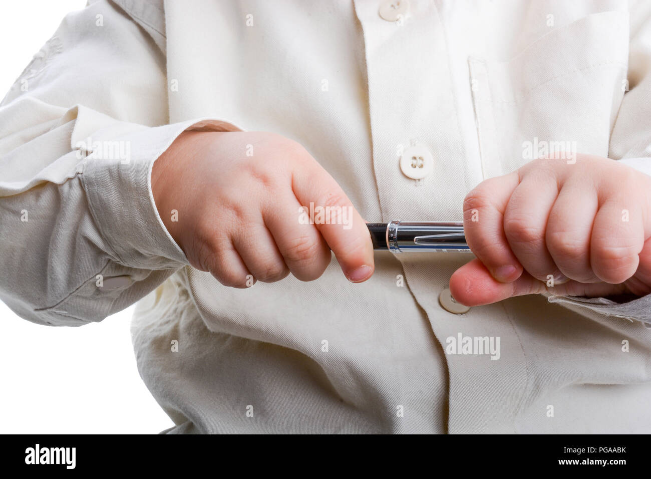 Baby holding a pen in his hand on a white background Stock Photo - Alamy