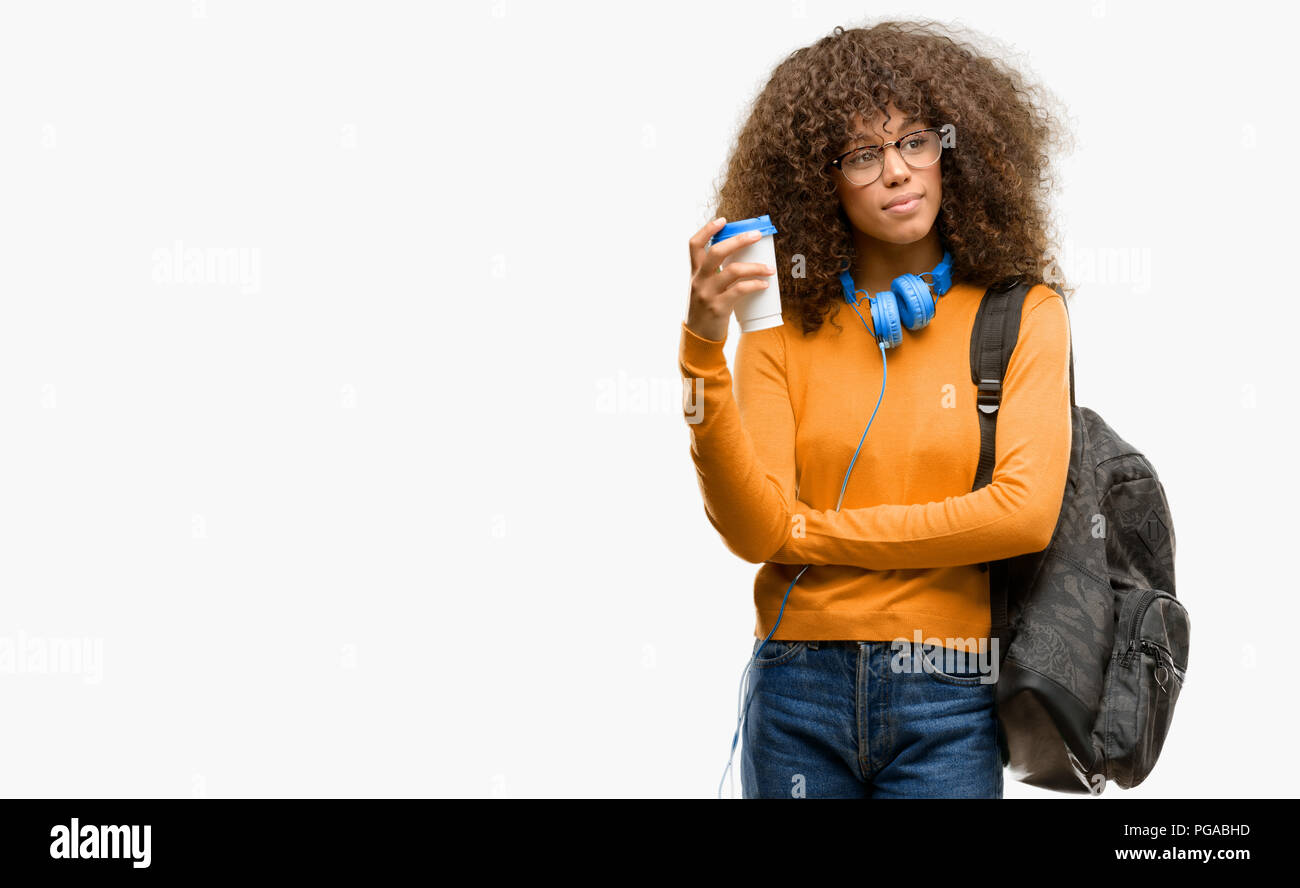 African american student woman thinking and looking up expressing doubt ...