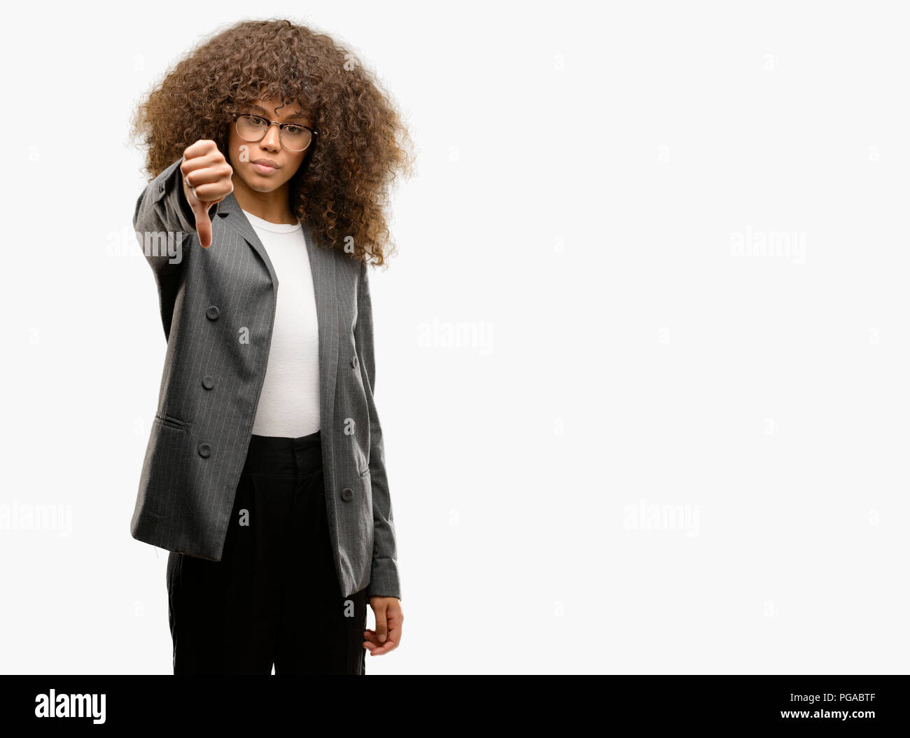 African american business woman wearing glasses looking unhappy and ...
