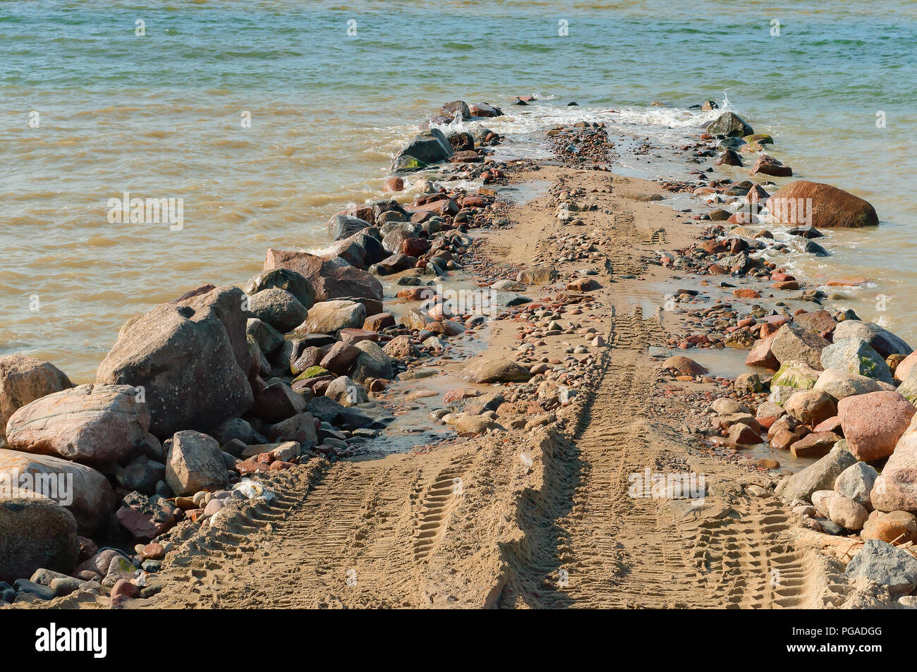construction equipment on the shore, the construction of breakwaters ...