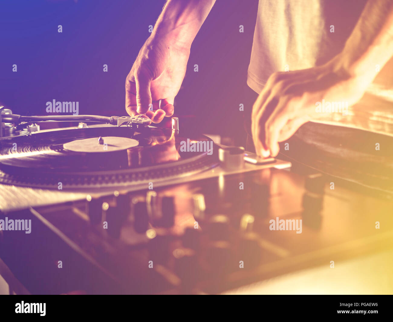 close up vintage look of dj playing vinyl record music on the party ...