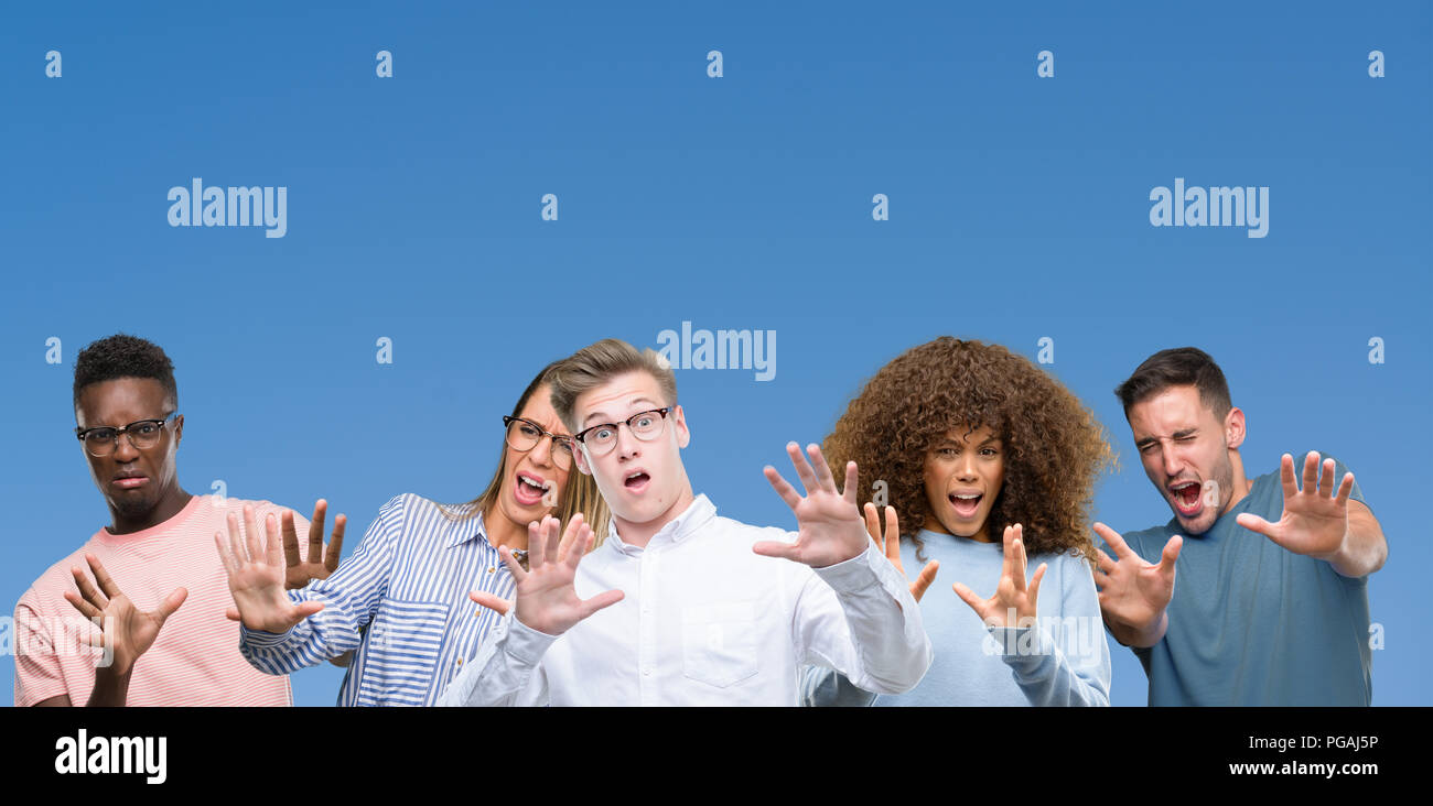 Composition of group of friends over blue blackground afraid and ...