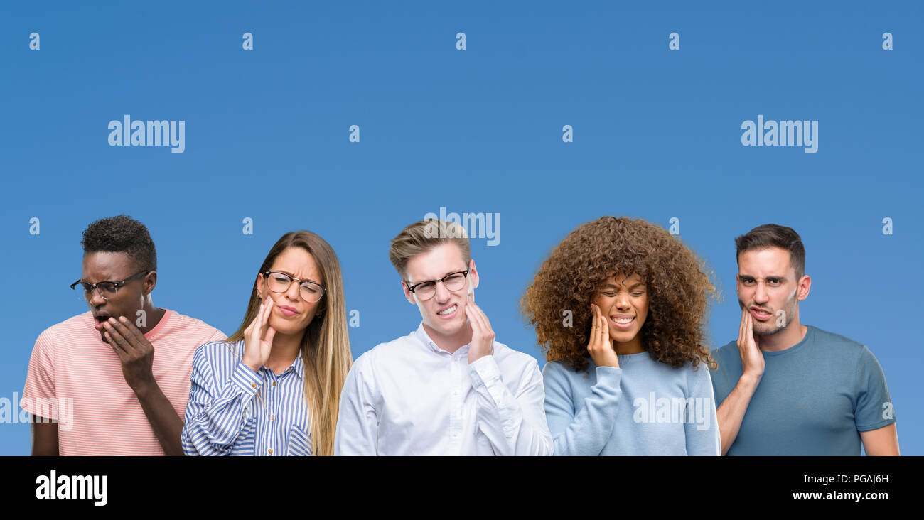 Composition of group of friends over blue blackground touching mouth ...