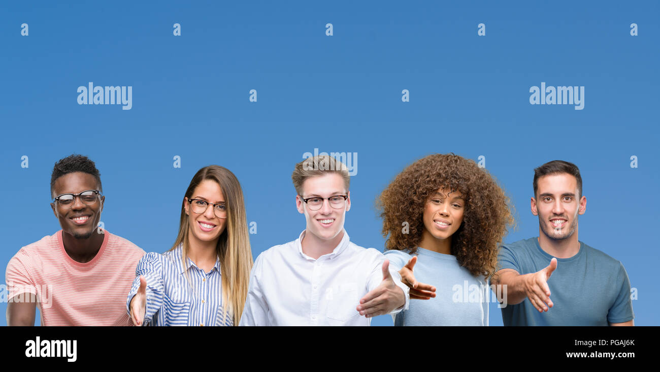 Composition of group of friends over blue blackground smiling friendly ...