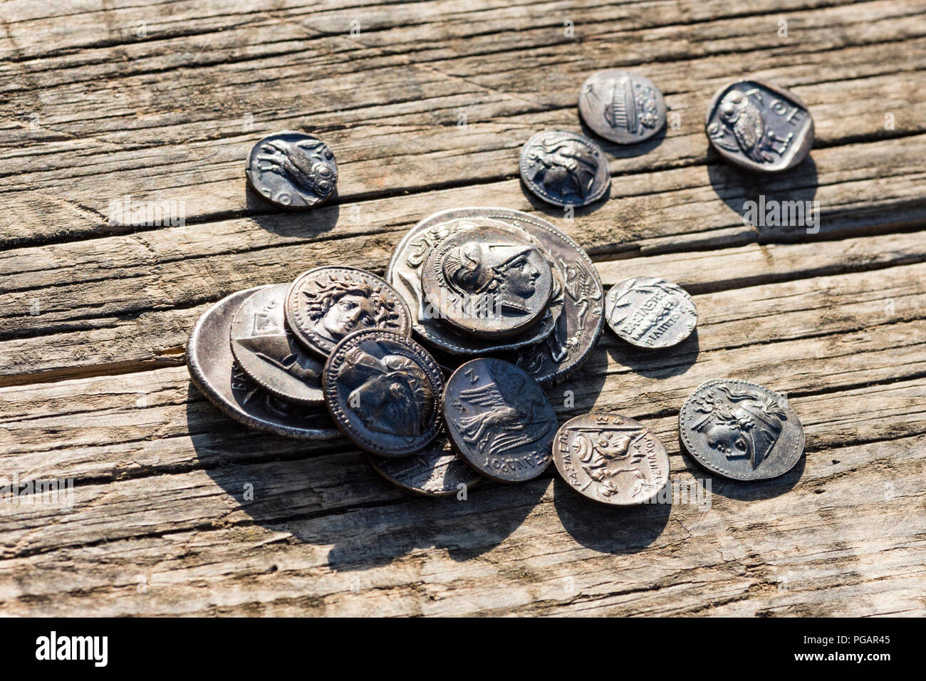 Ancient greek bronze coins hi-res stock photography and images - Alamy