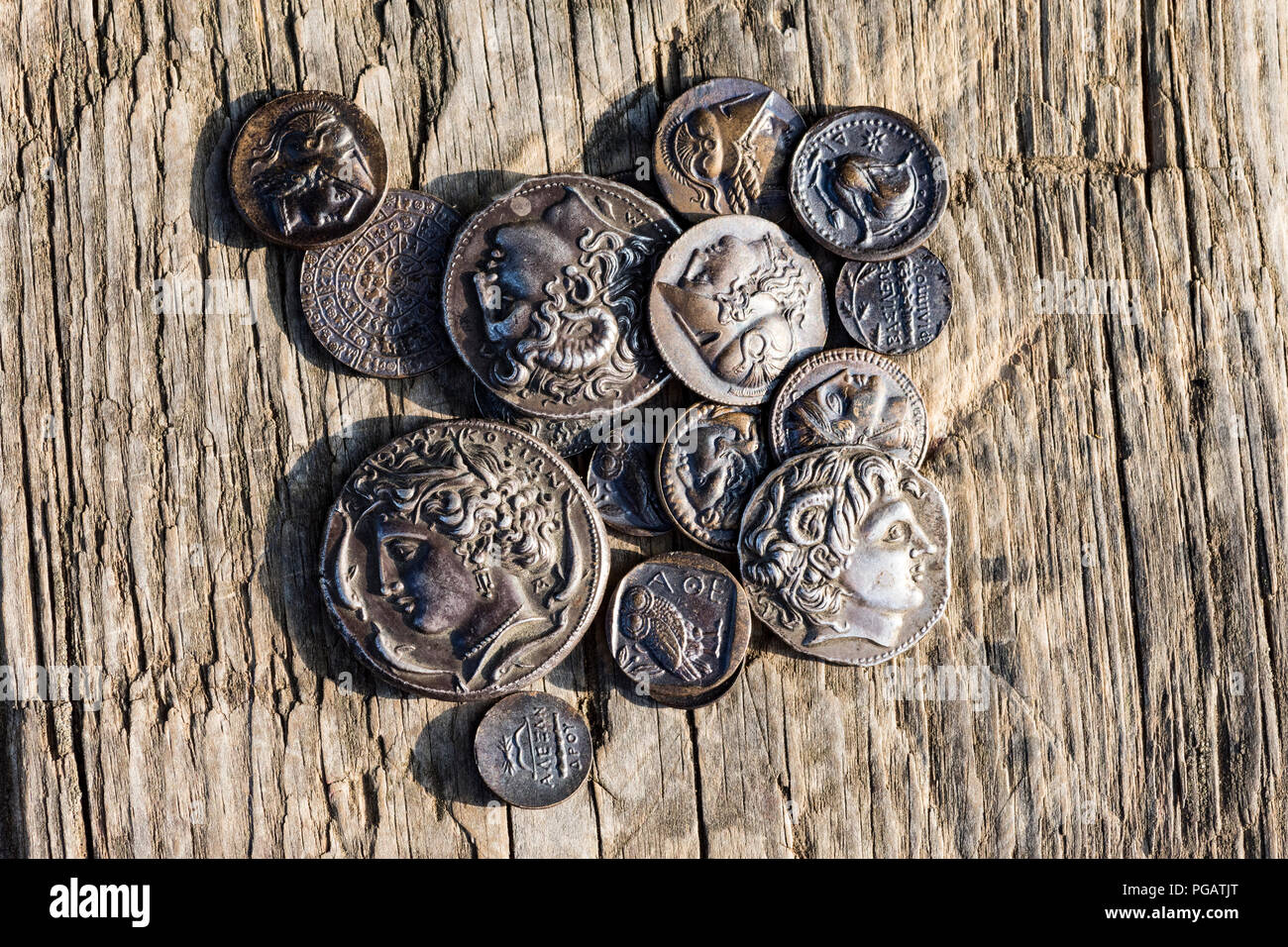 Ancient greek bronze coins hi-res stock photography and images - Alamy