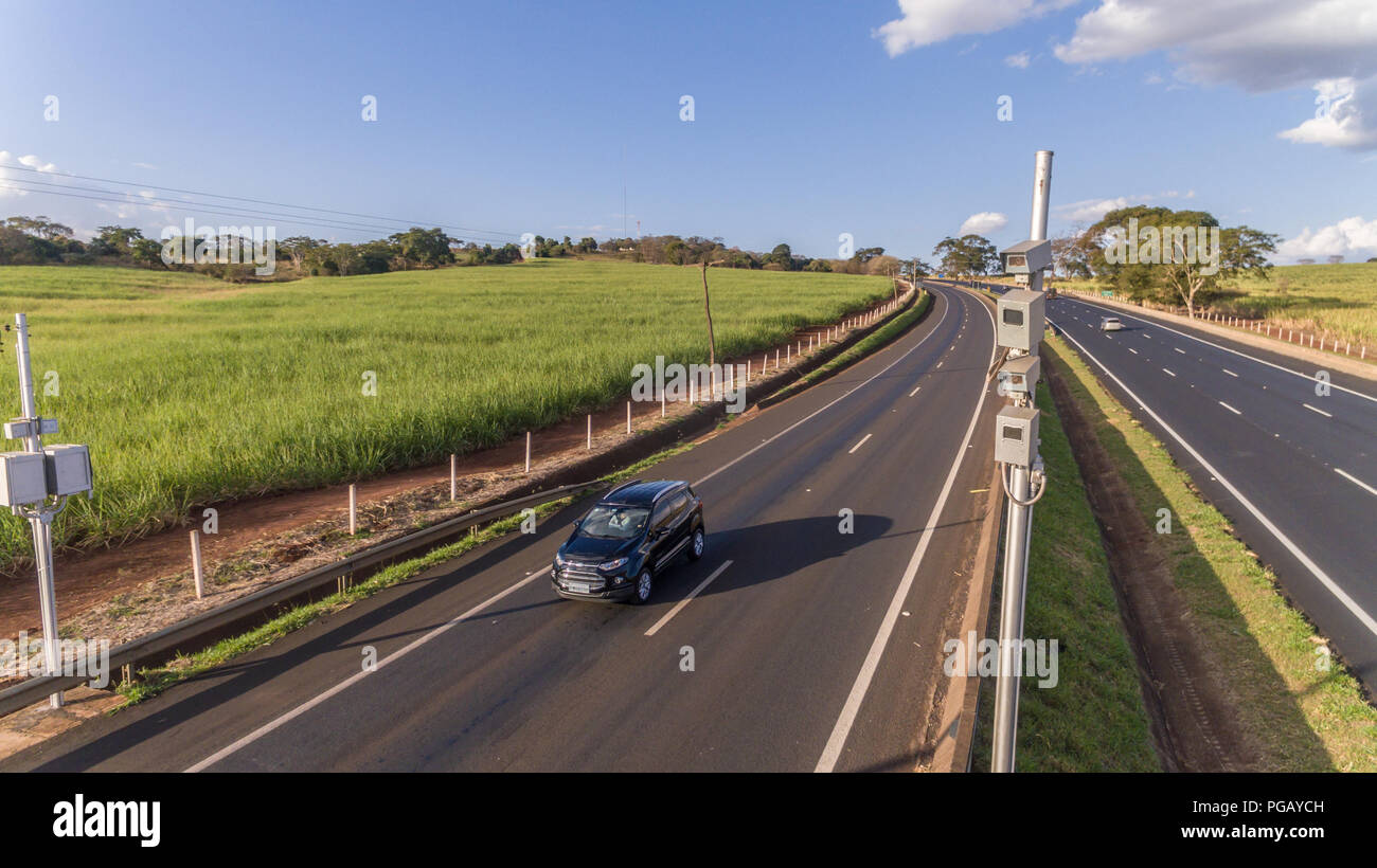 Traffic radar with speed enforcement camera in a highway. Automatic ...