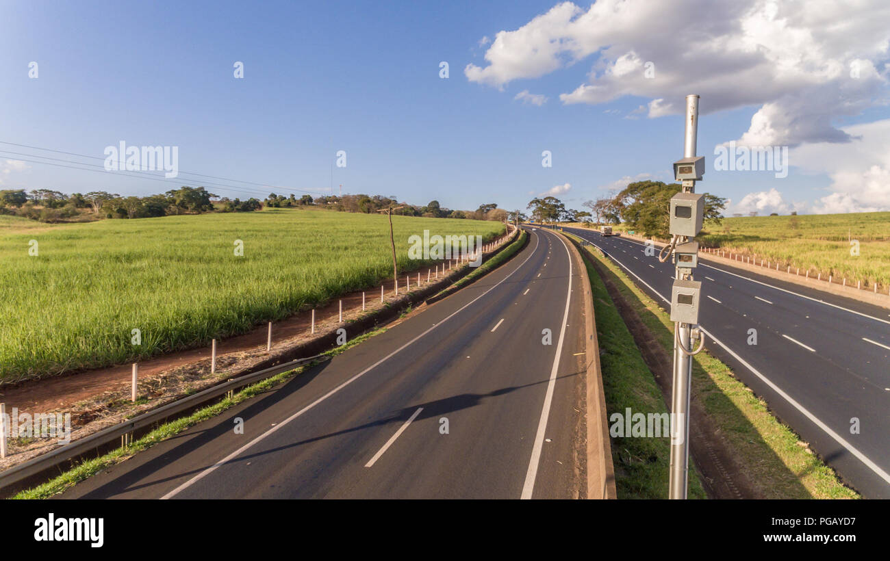 Traffic radar with speed enforcement camera in a highway. Automatic ...