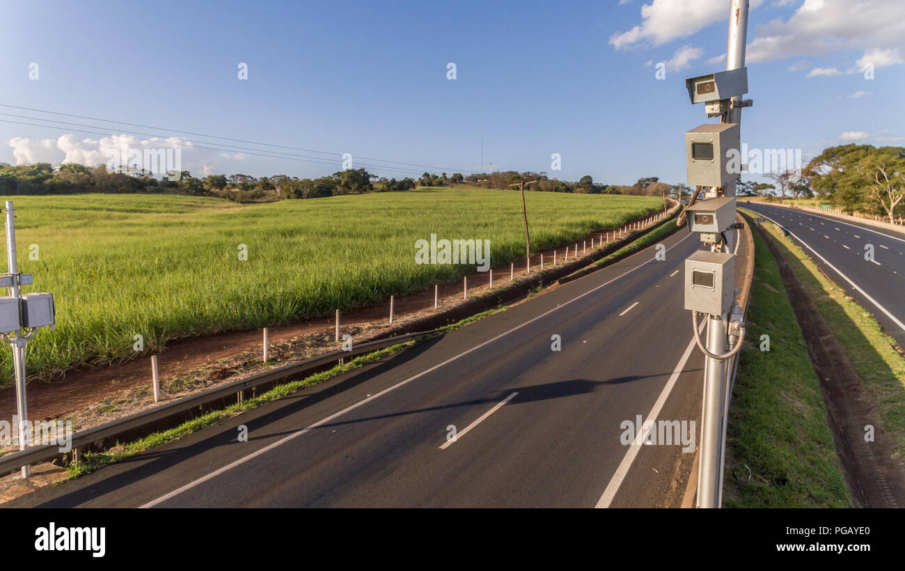 Traffic radar with speed enforcement camera in a highway. Automatic ...