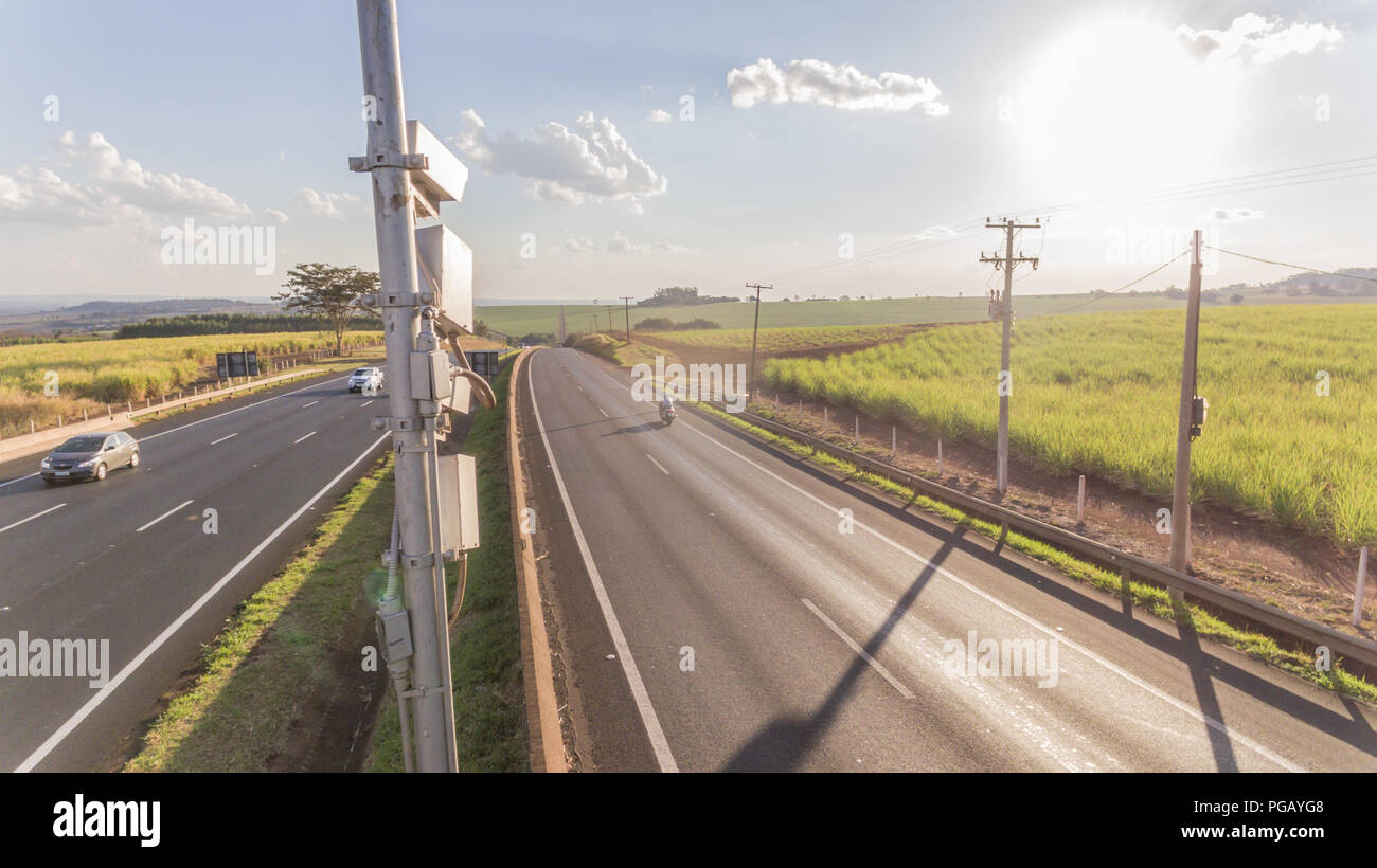 Traffic radar with speed enforcement camera in a highway. Automatic ...
