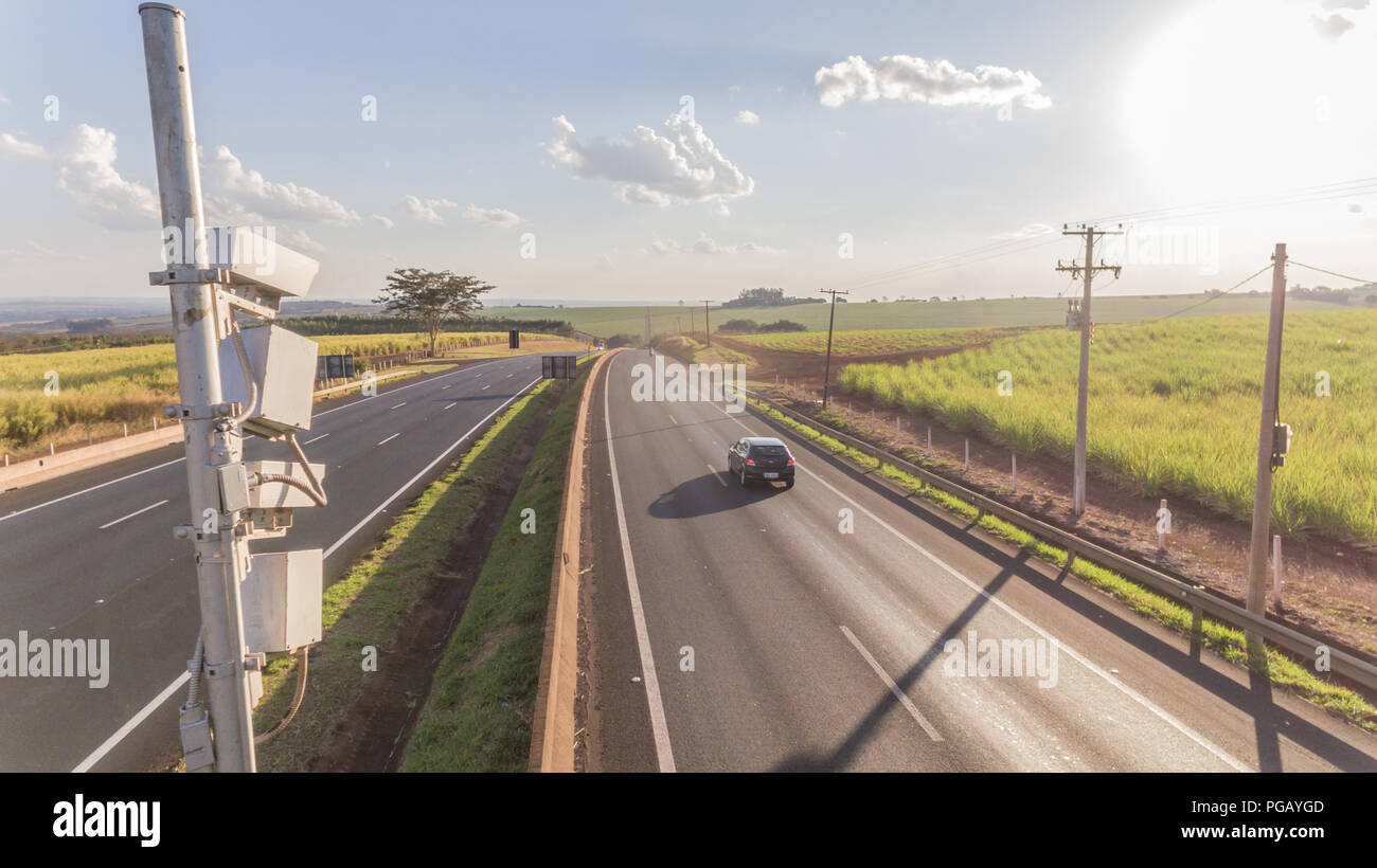 Traffic radar with speed enforcement camera in a highway. Automatic ...