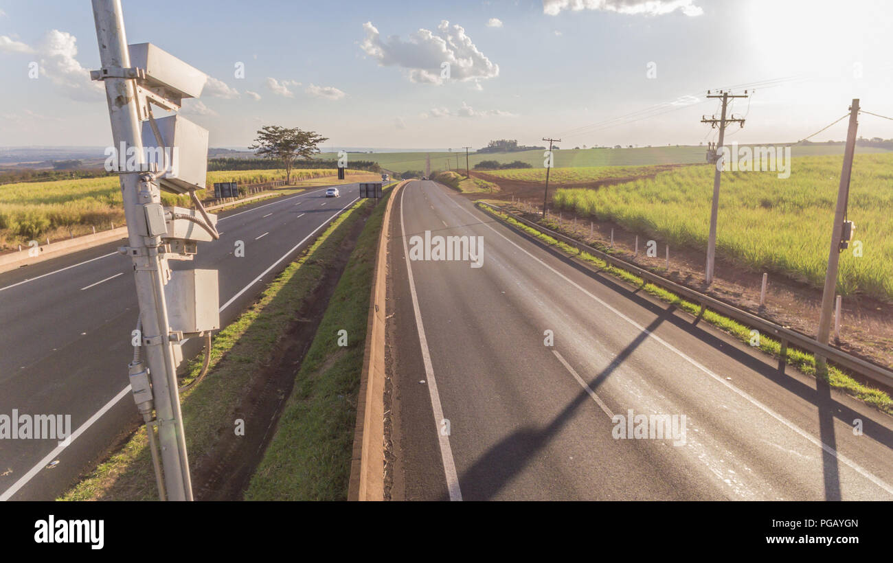 Traffic radar with speed enforcement camera in a highway. Automatic ...