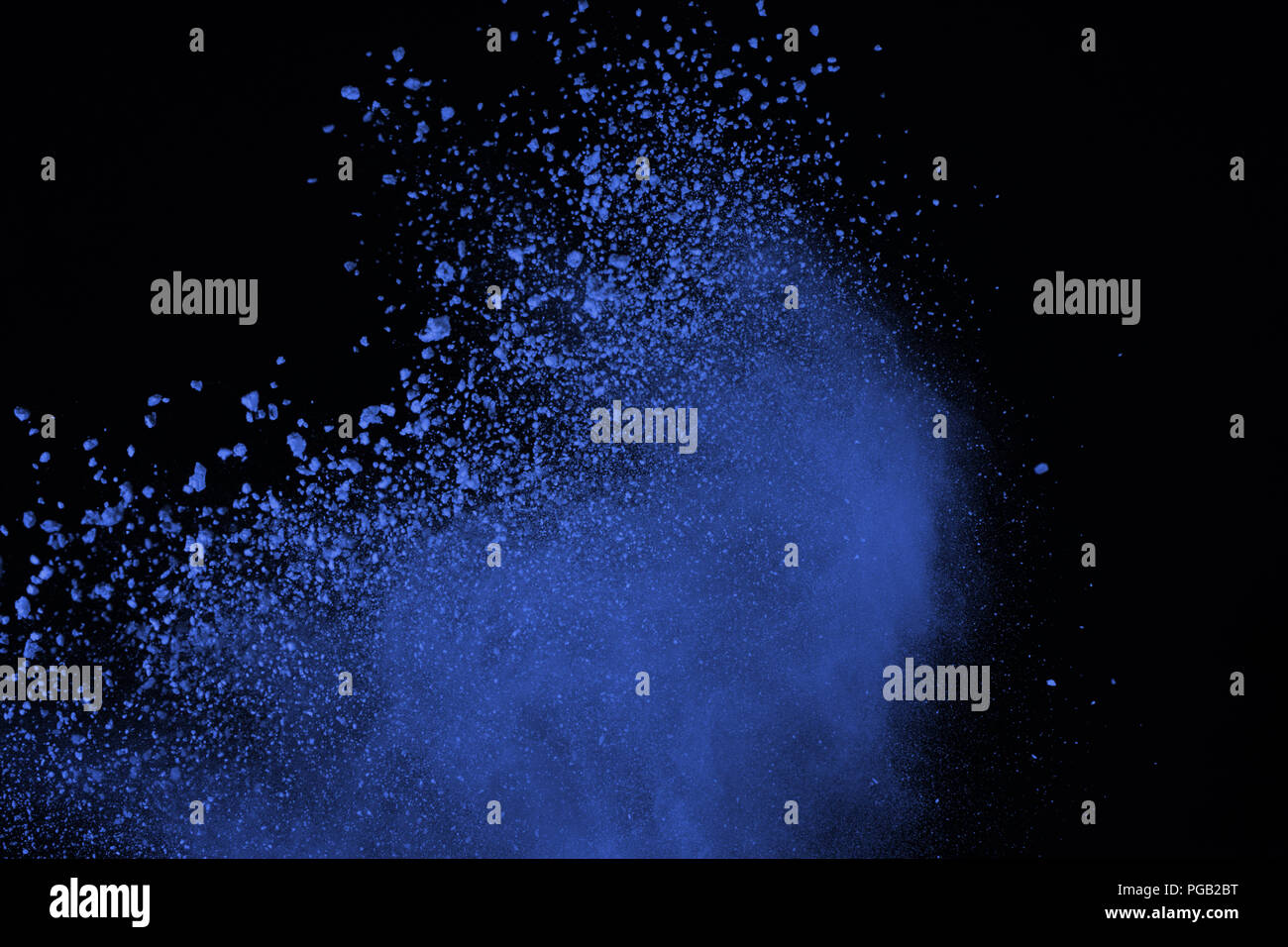 Blue powder explosion on black background. Colored cloud. Color dust ...