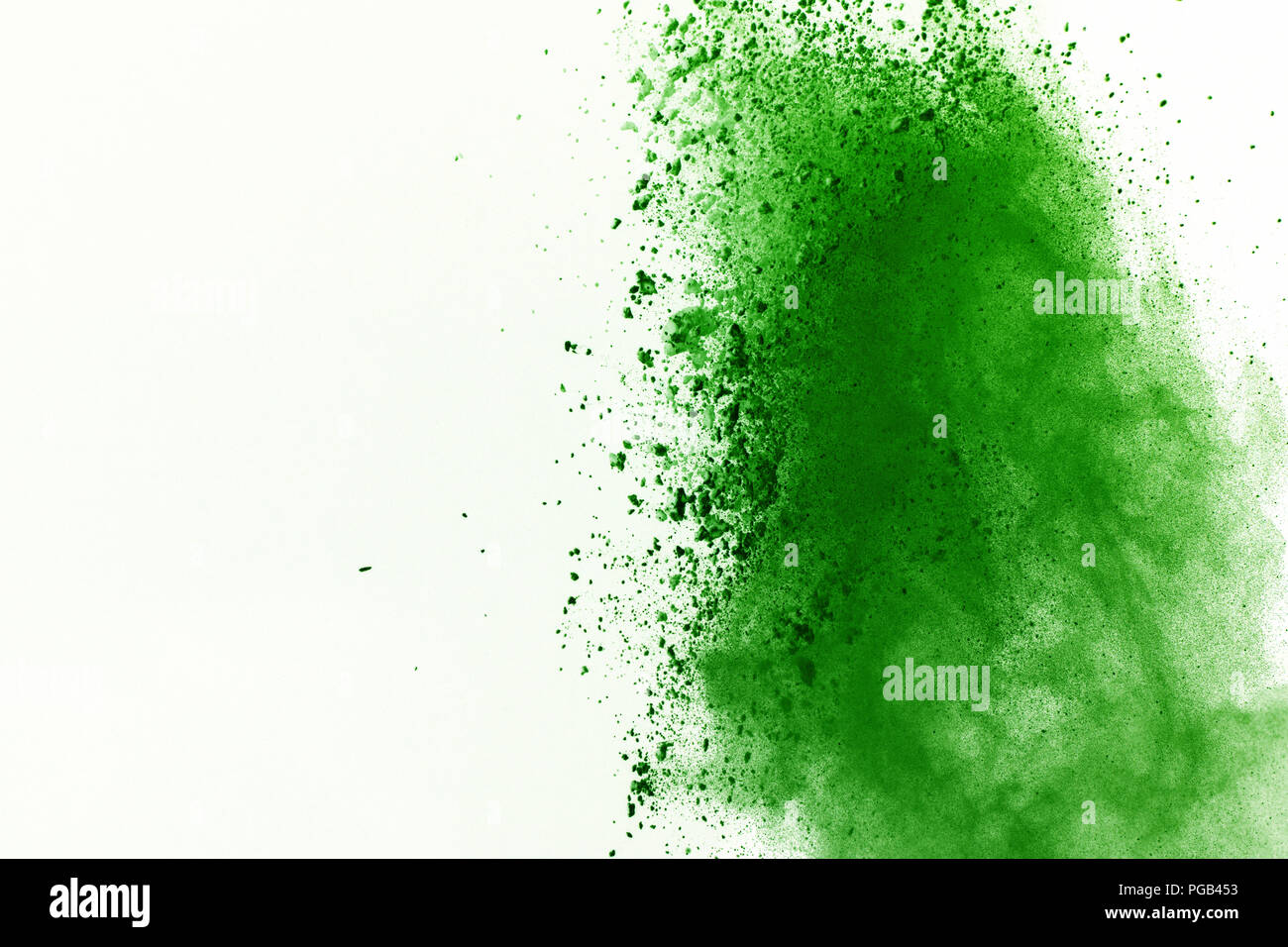 Freeze motion of Green powder exploding on white background Stock Photo ...