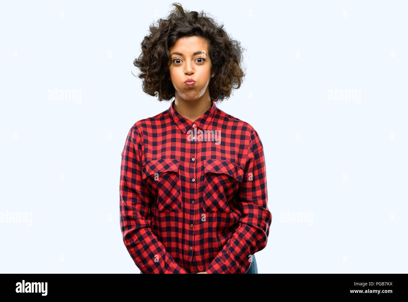 Puffing out cheeks hi-res stock photography and images - Alamy