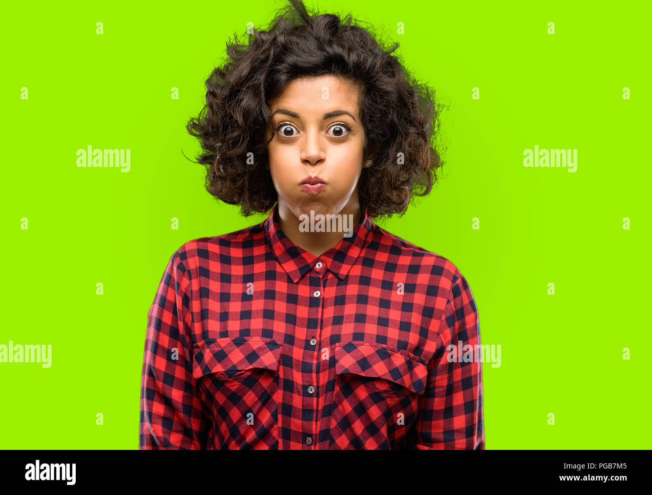 Puffing out cheeks hi-res stock photography and images - Alamy