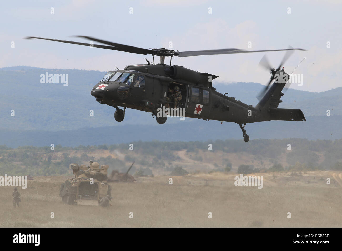 A U.S. Army UH-60 Black Hawk helicopter prepares to land during a ...
