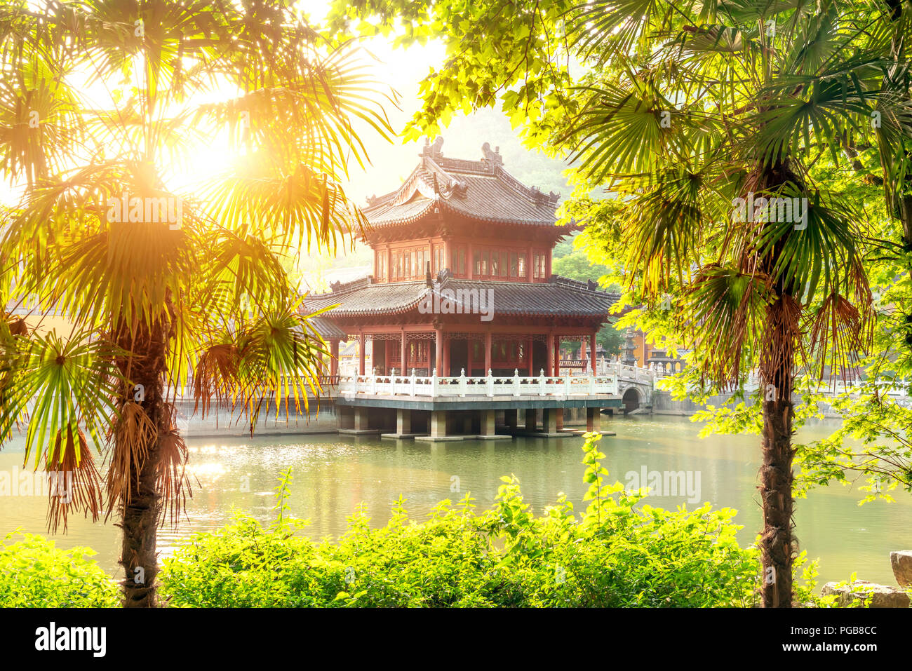 Chinese traditional classical architecture by the lake Stock Photo - Alamy