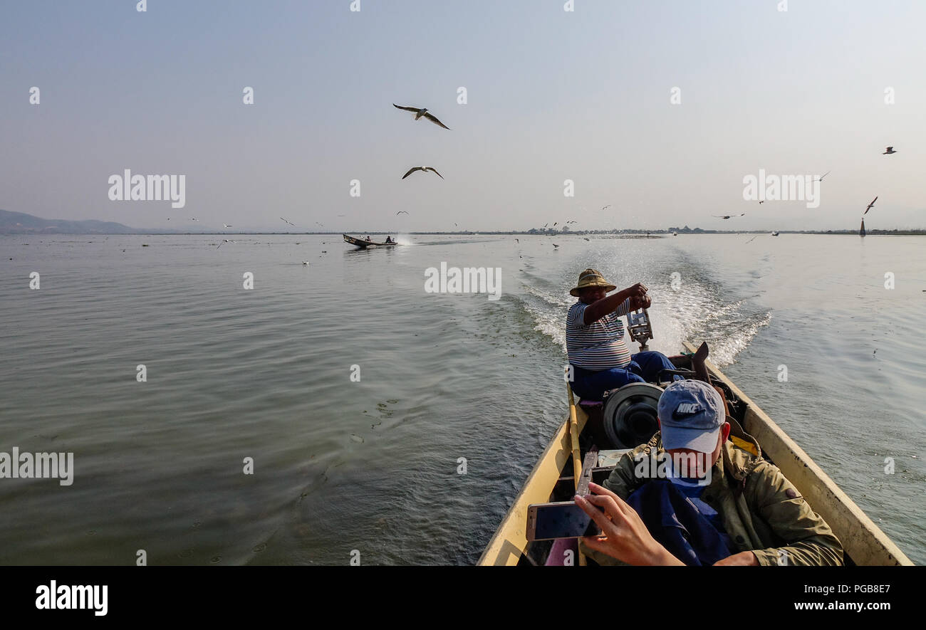 Inle, Myanmar - Feb 15, 2016. Speed boat running on Inle (Inlay) lake ...