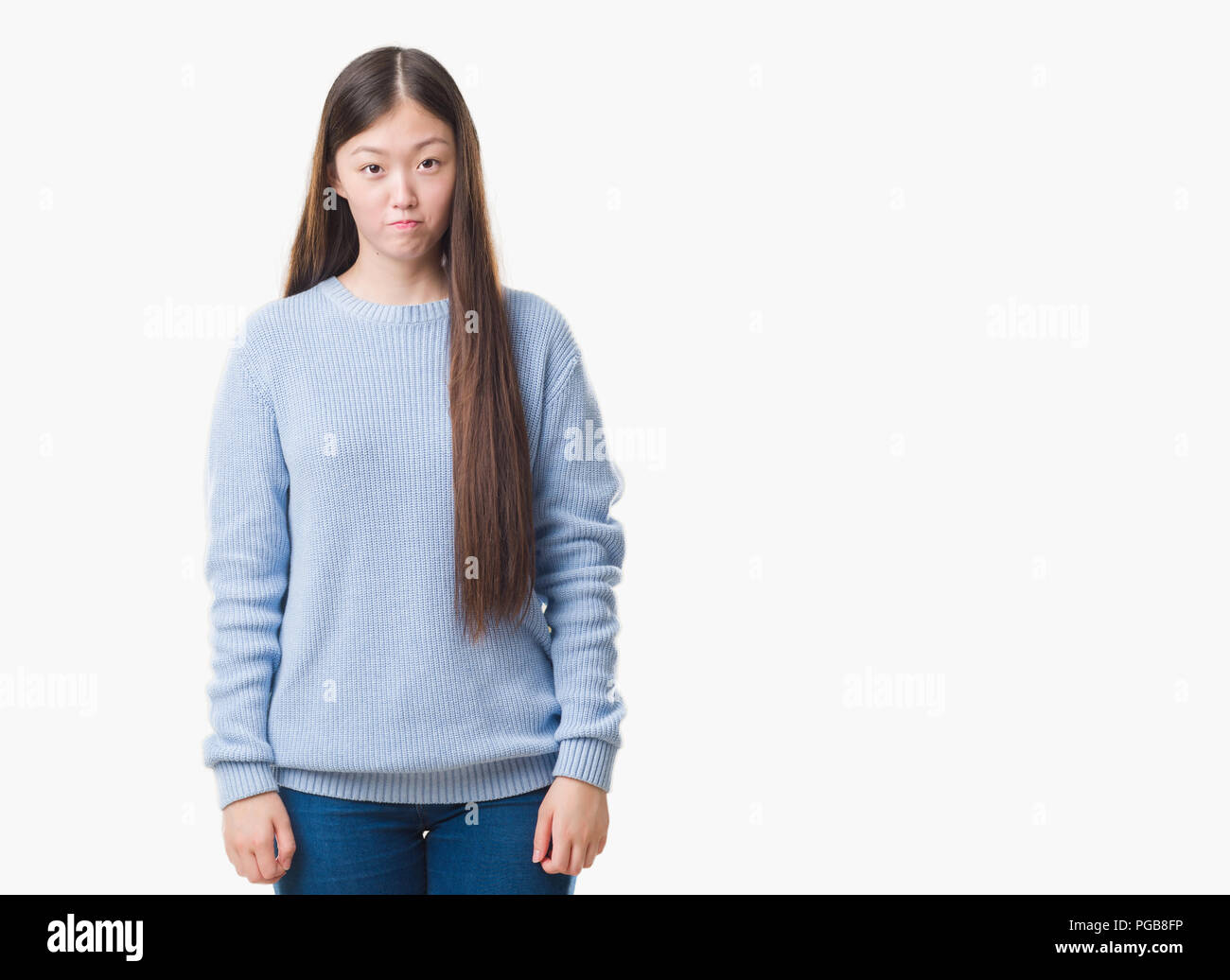 Young Chinese woman over isolated background depressed and worry for ...