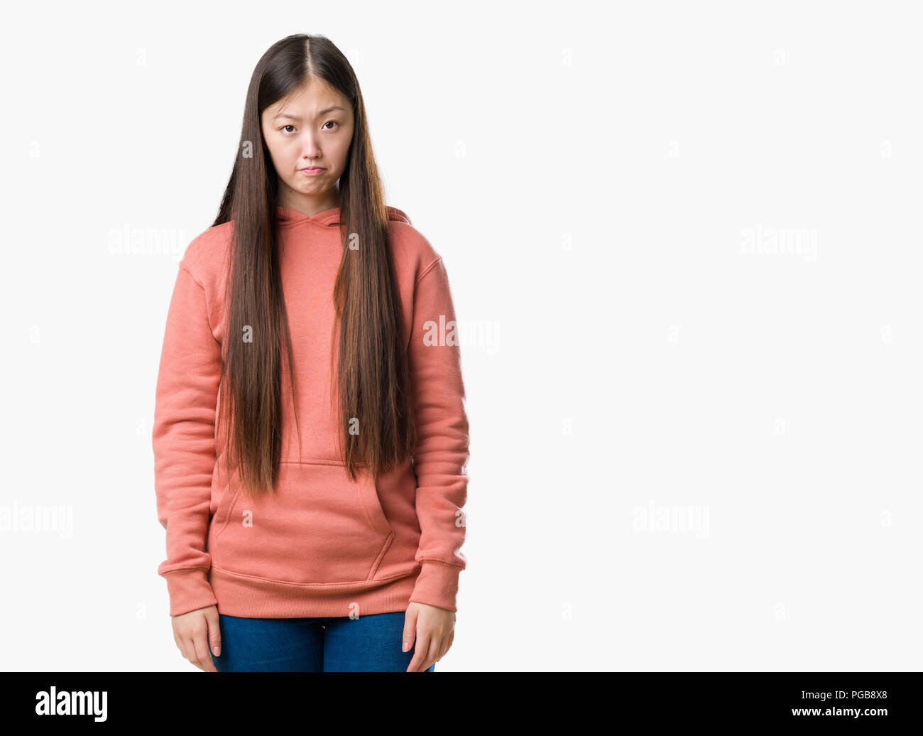 Young Chinese woman over isolated background wearing sport sweathshirt ...