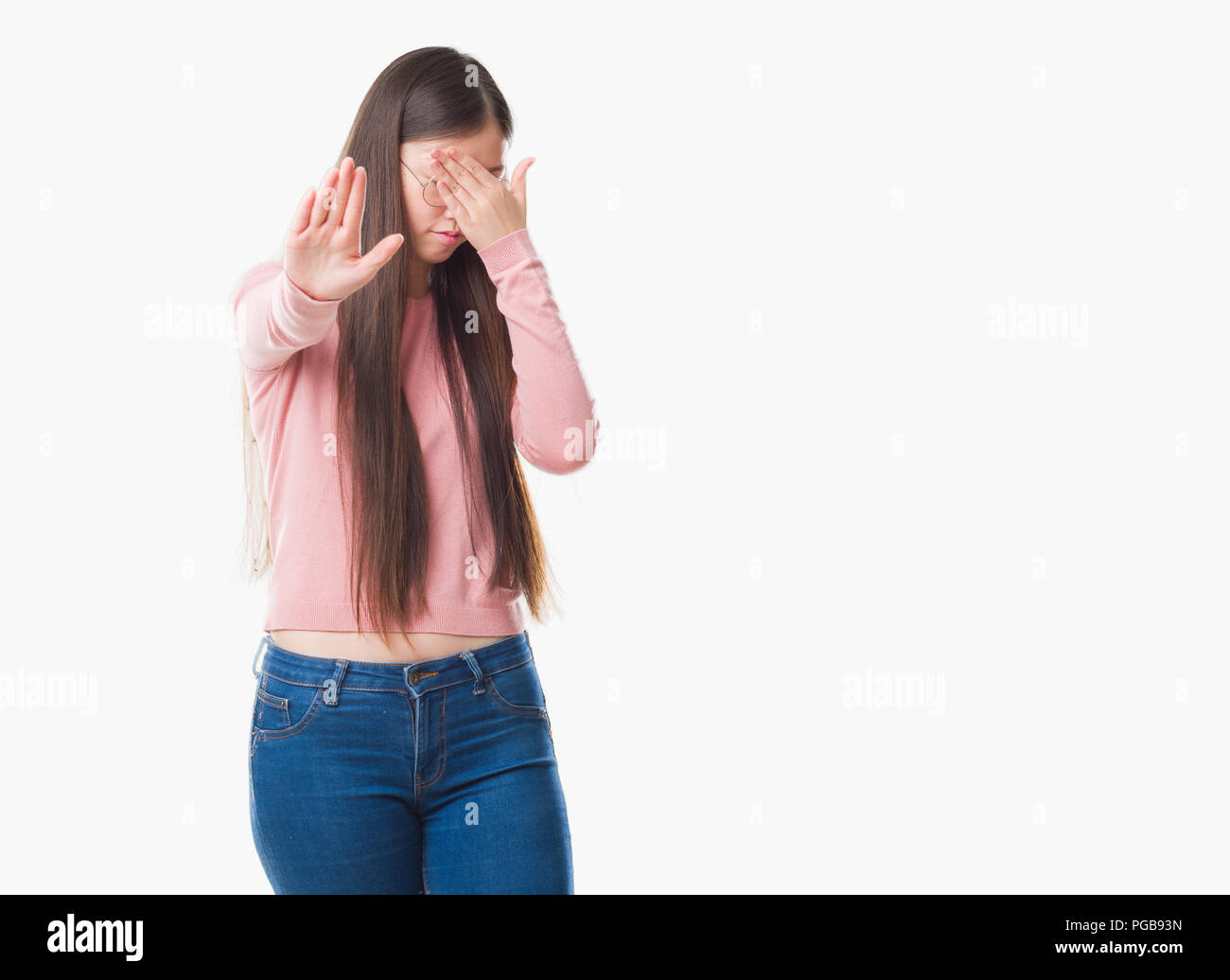 Young Chinese woman over isolated background wearing glasses covering ...