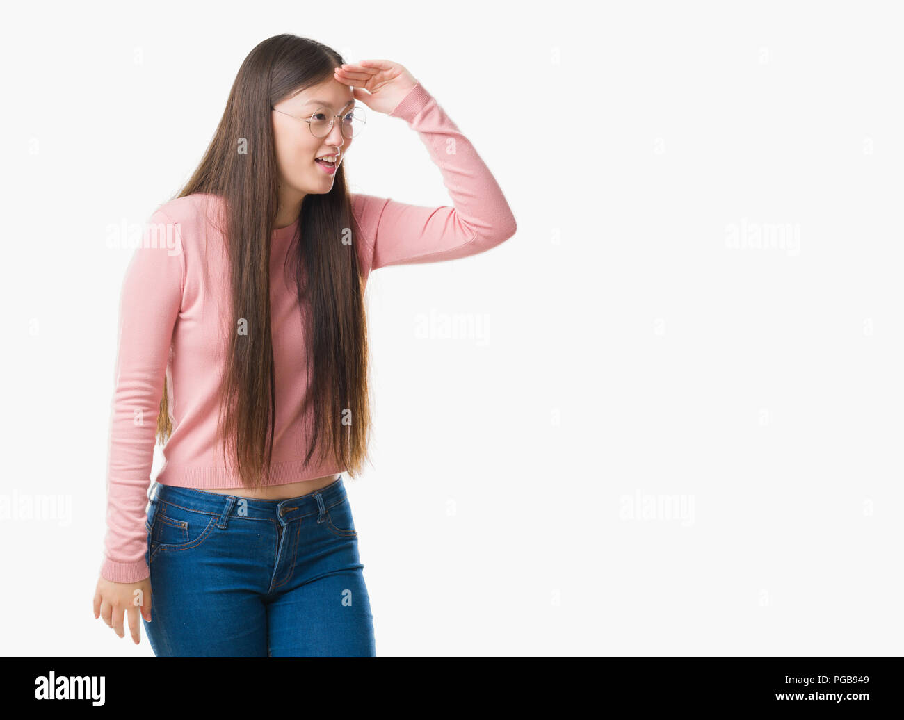 Young Chinese woman over isolated background wearing glasses very happy ...