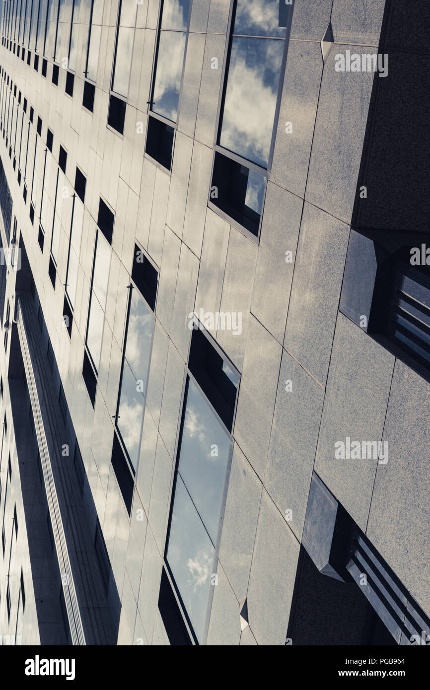 Perspective view of the pattern of windows on a tall downtown building ...
