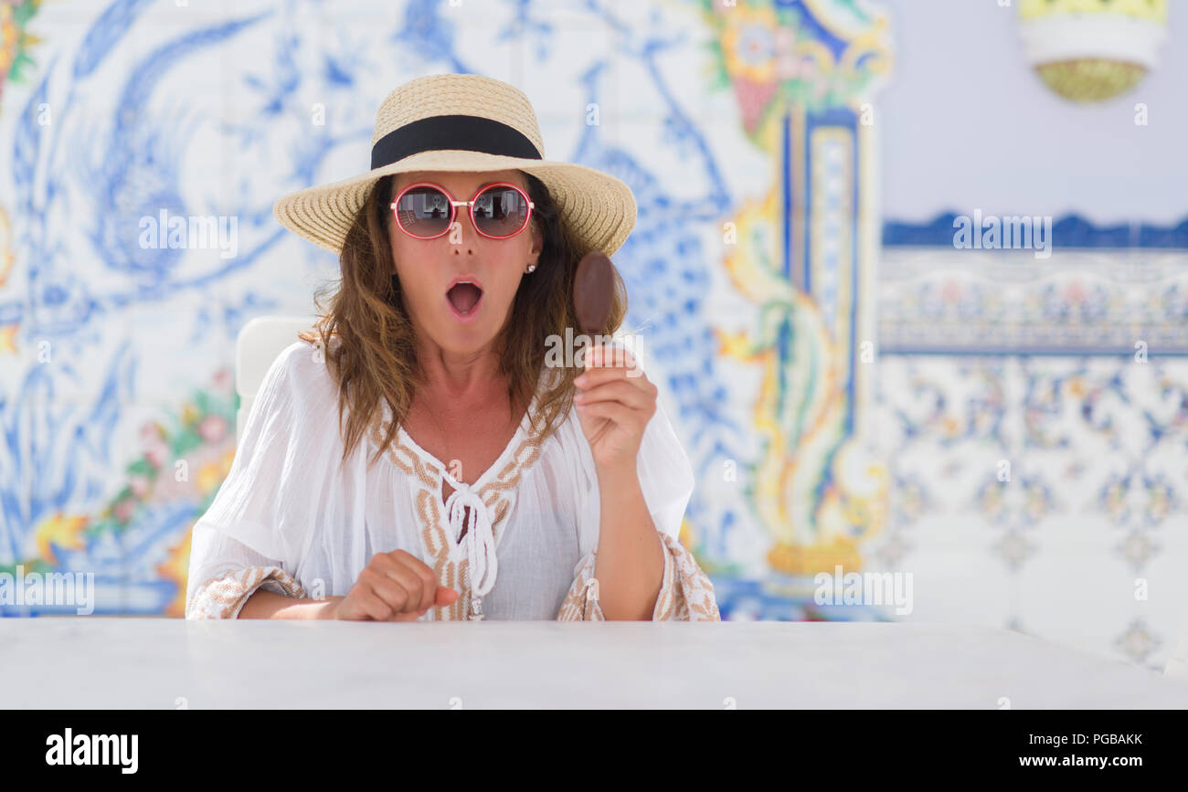 Sad woman eating ice cream hi-res stock photography and images - Alamy