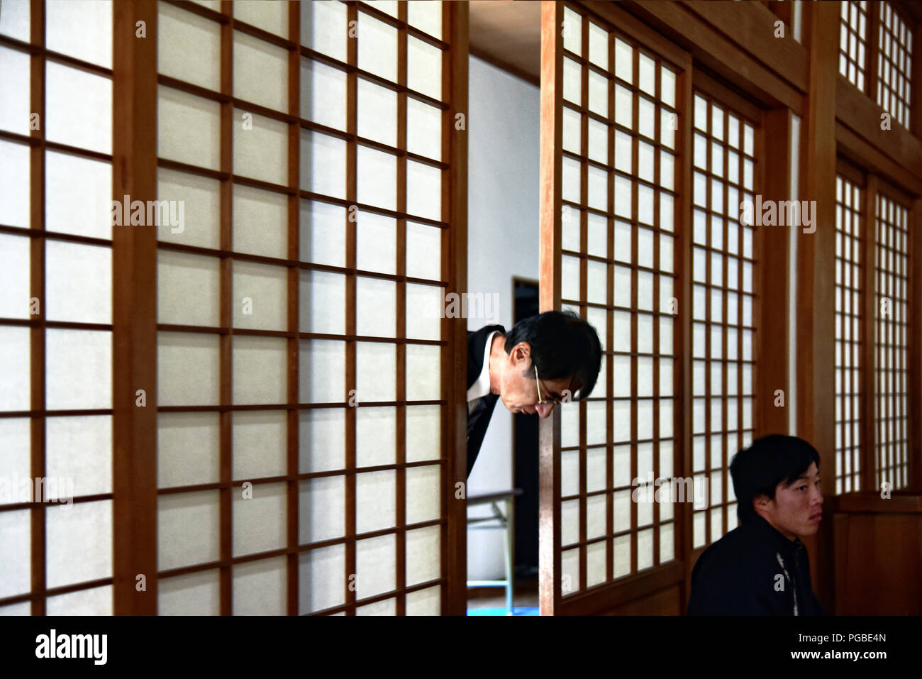 Okayama, Japan: The Japanese Buddhist is bowing for respect before to ...