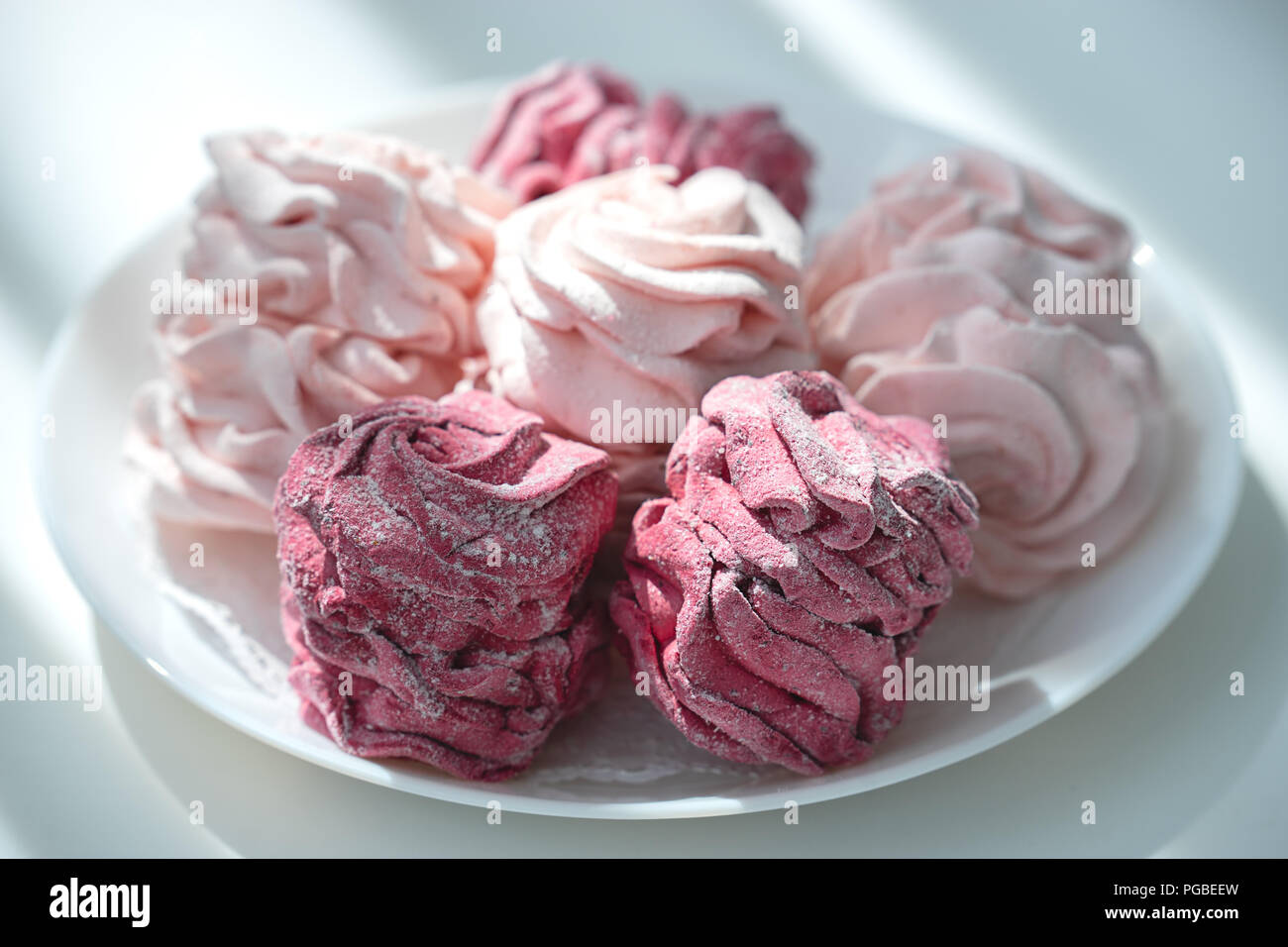 Homemade sweet fresh zephyr, marshmallow on white plate Stock Photo - Alamy