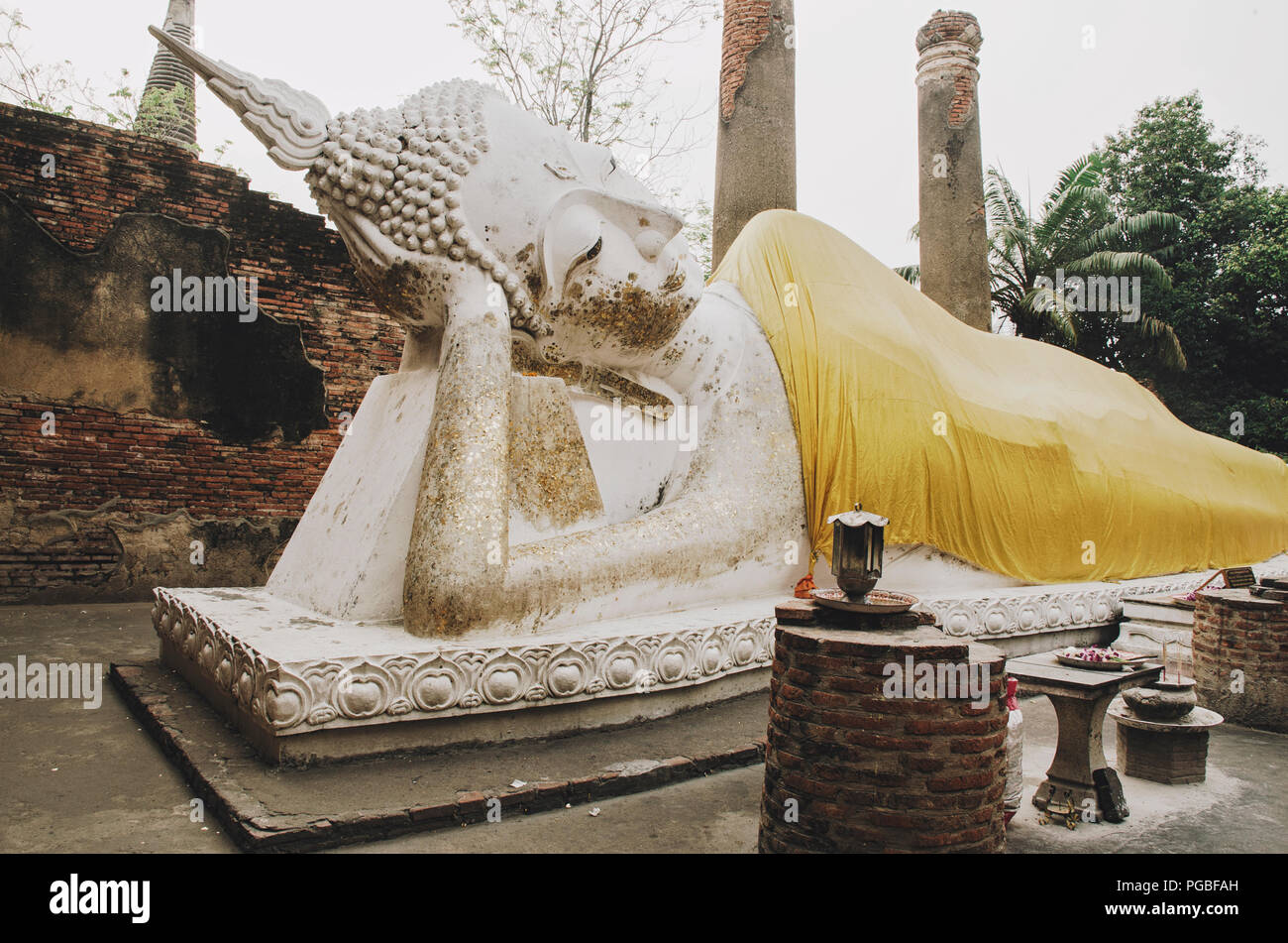 Carved stone Buddha statue; wat/temple complex in old Siam kingdom ...